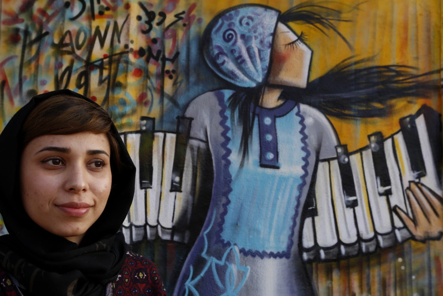 In Pics: Afghanistan's First Woman Street Artist Beautifully Portrays ...